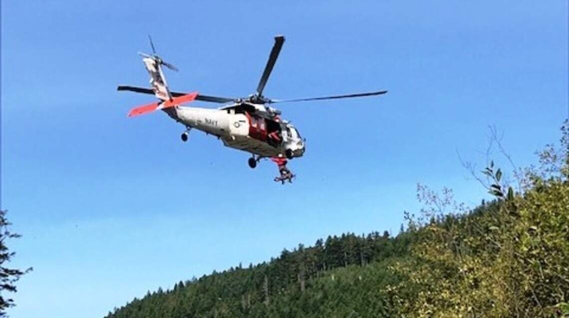 Navy helicopter pulls Injured backpacker out of Elwha Valley | The Olympian